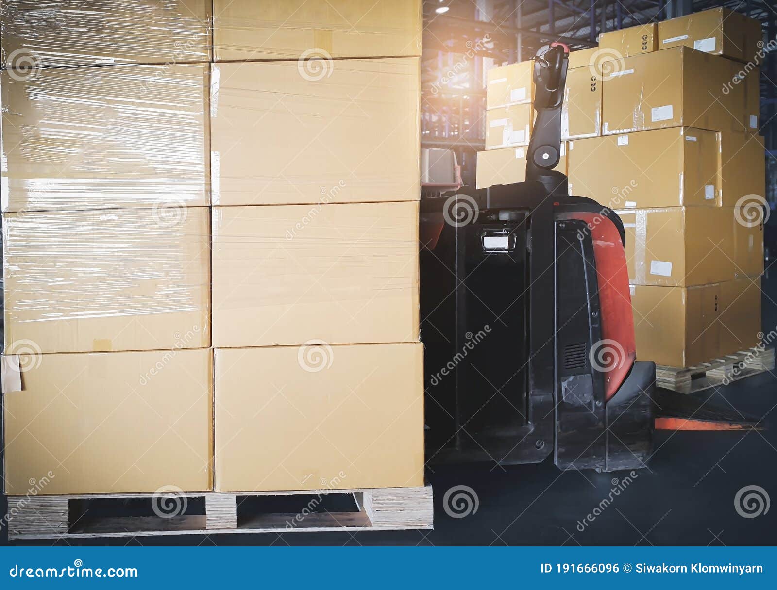 Stack Of Shipment Boxes Wrapping Plastic On Wooden Pallets At Interior ...