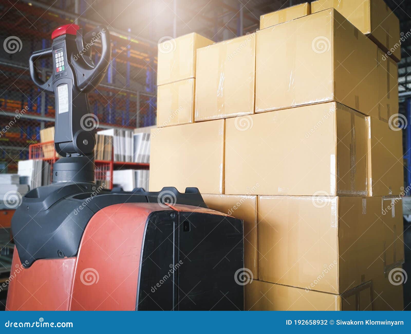 Stack of Shipment Cardboard Boxes with Electric Forklift Pallet Jack at ...