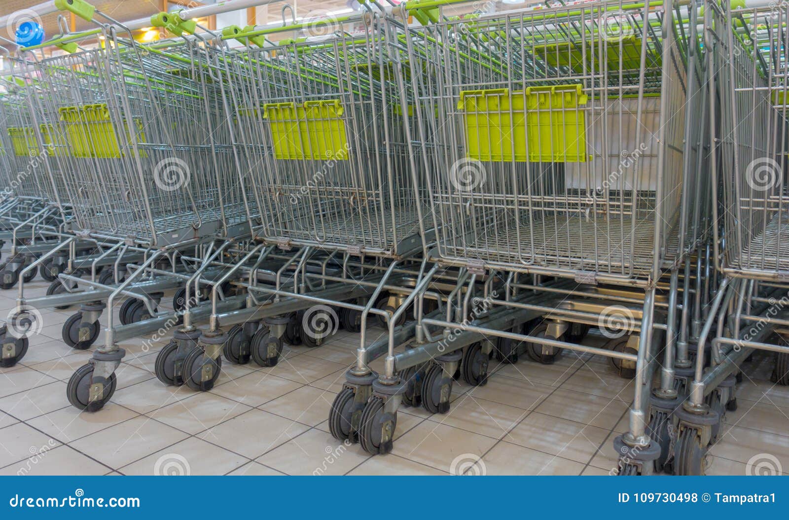 Stack of Shopping Carts in a Supermarket Store Stock Photo - Image of ...