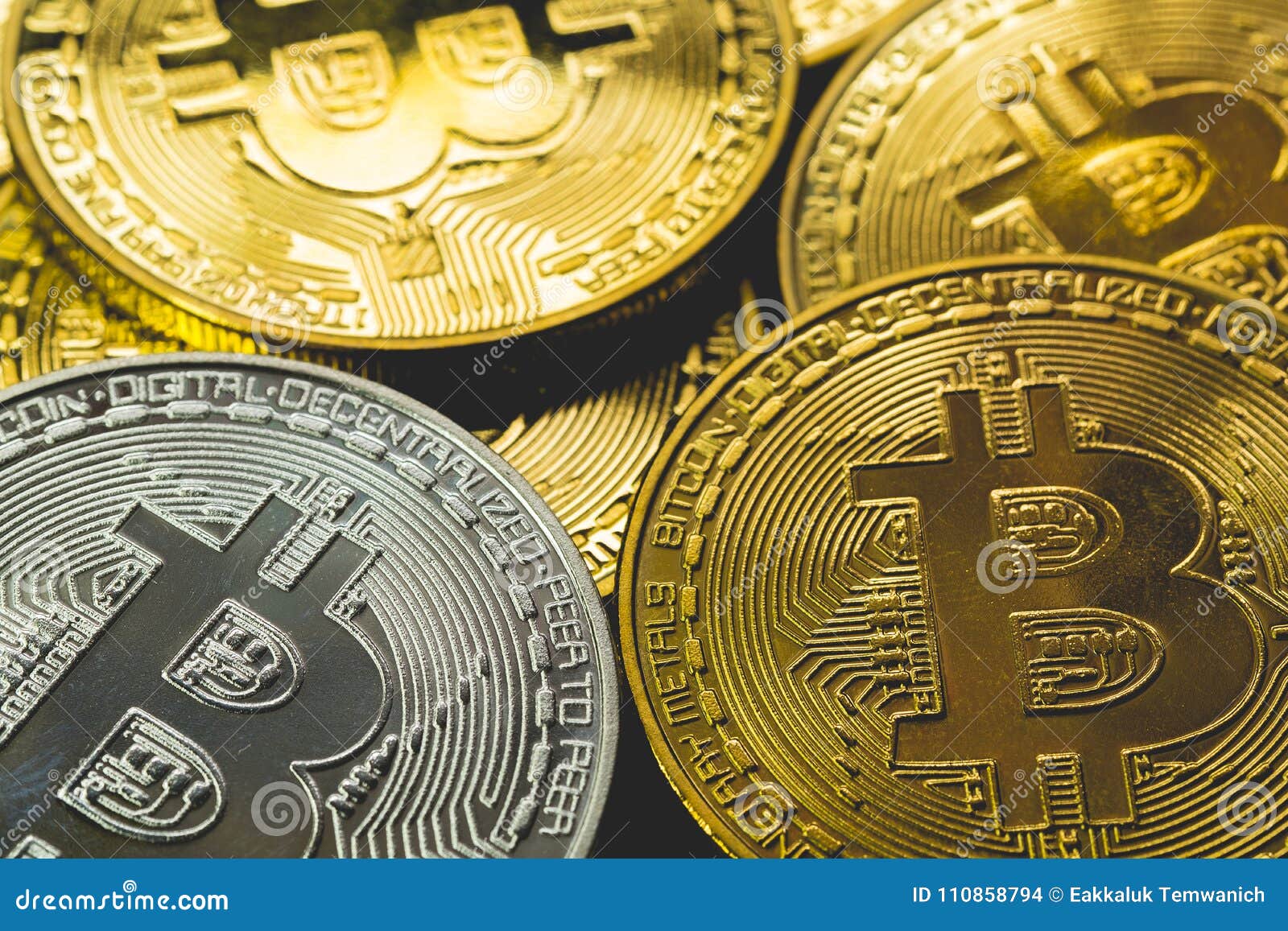 Stack of Silver and Gold Bitcoins with Gold Background and Business and ...