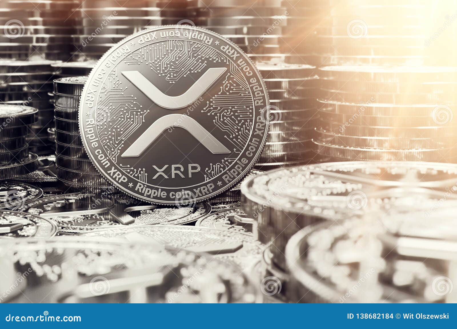 Stack of Silver Ripple XRP Coins in Blurry Closeup with Lens Flare As a ...