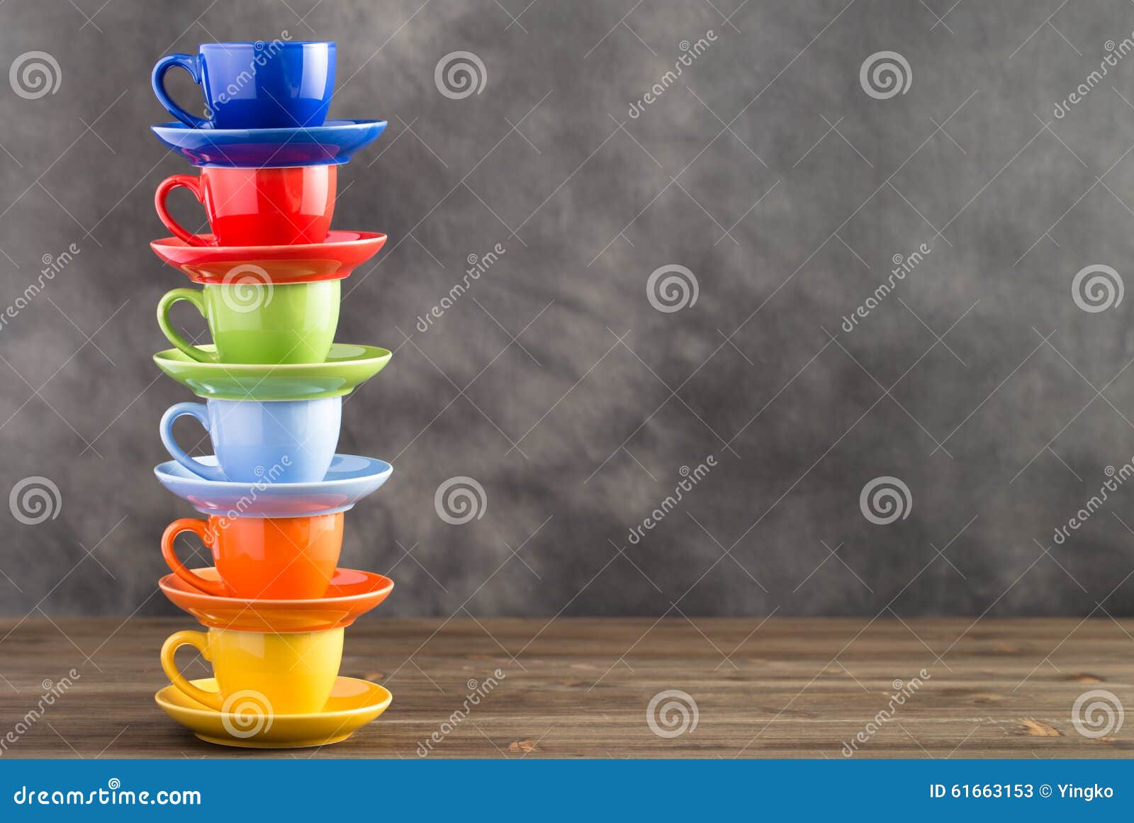 Stack of Six Multicolored Cups on Table from Left Side Stock Image ...