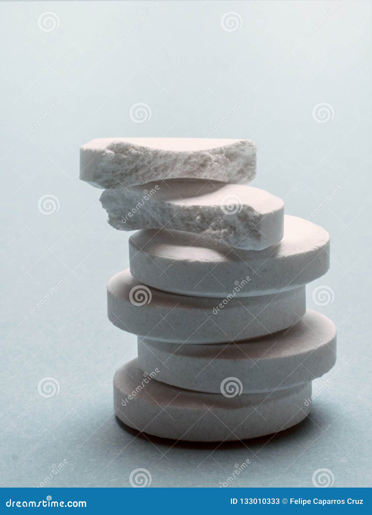A Stack of Six White Tablets, Top Two Broken in Half Stock Image ...