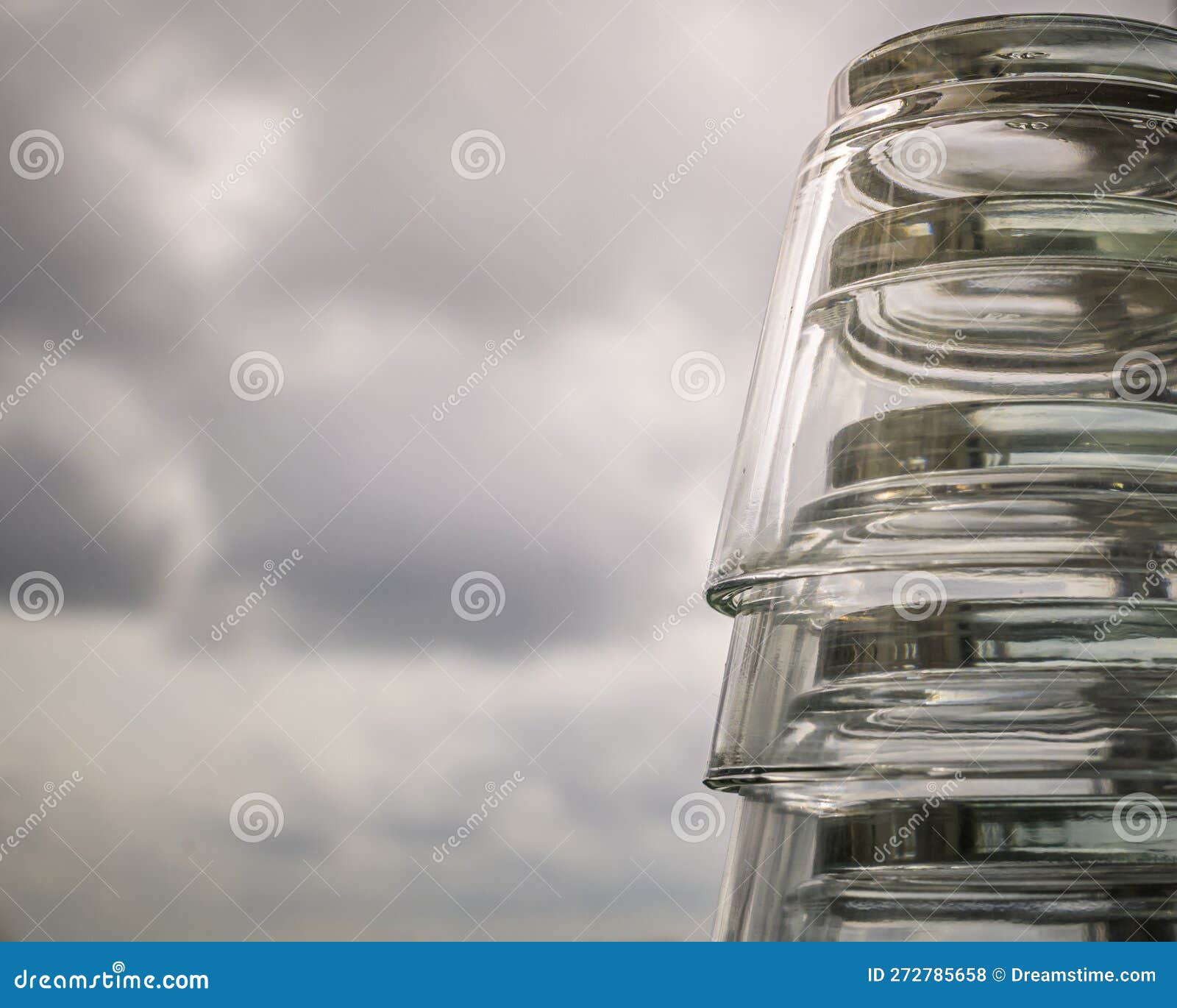 A Stack of Small Glass Cups by the Window. Stock Photo - Image of ...
