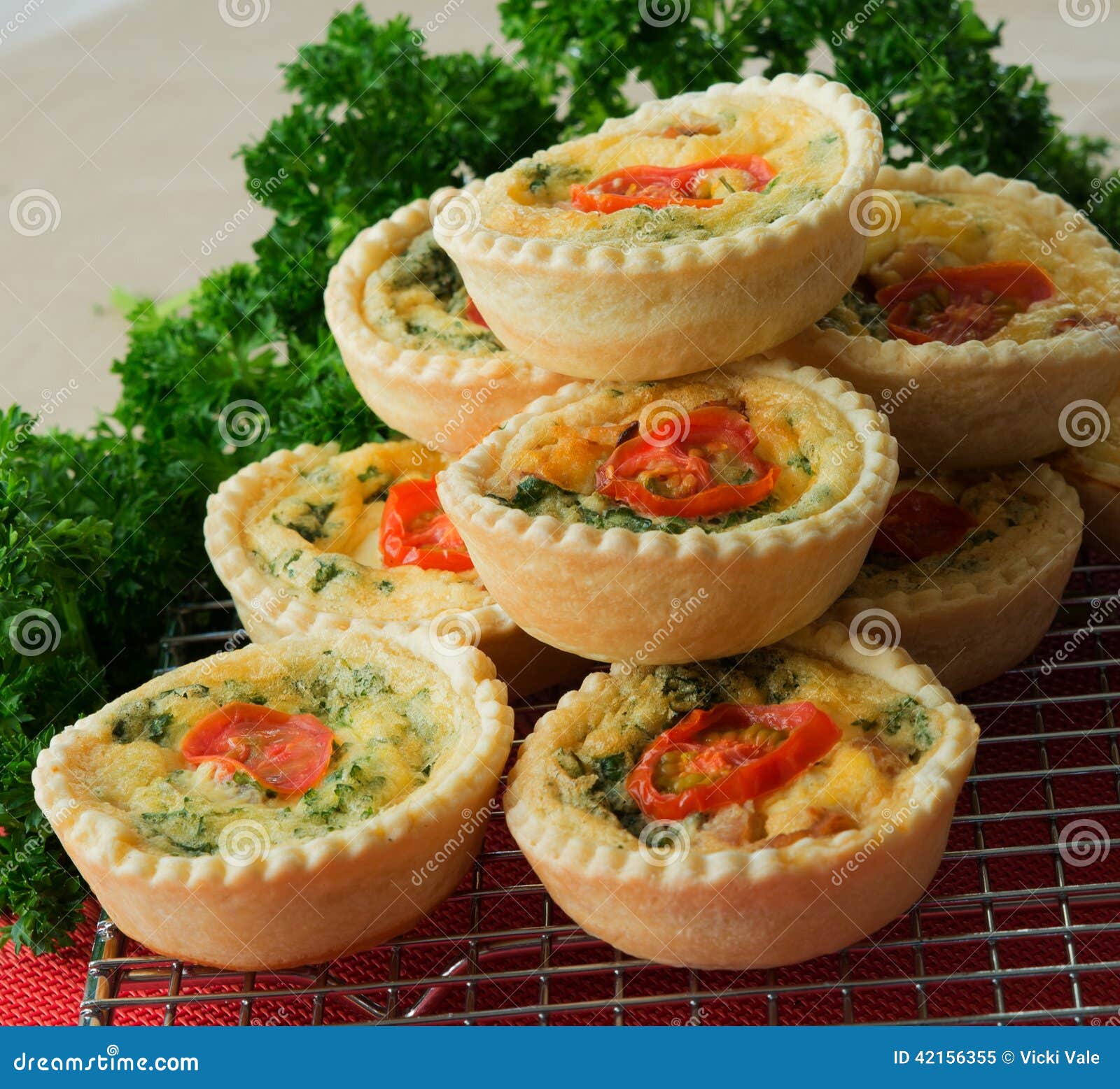 Stack of Small Individual Quiche with Parsley. Stock Image - Image of ...