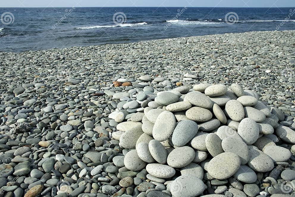 Stack of Small Smooth Stones on Shore Stock Image - Image of abstract ...