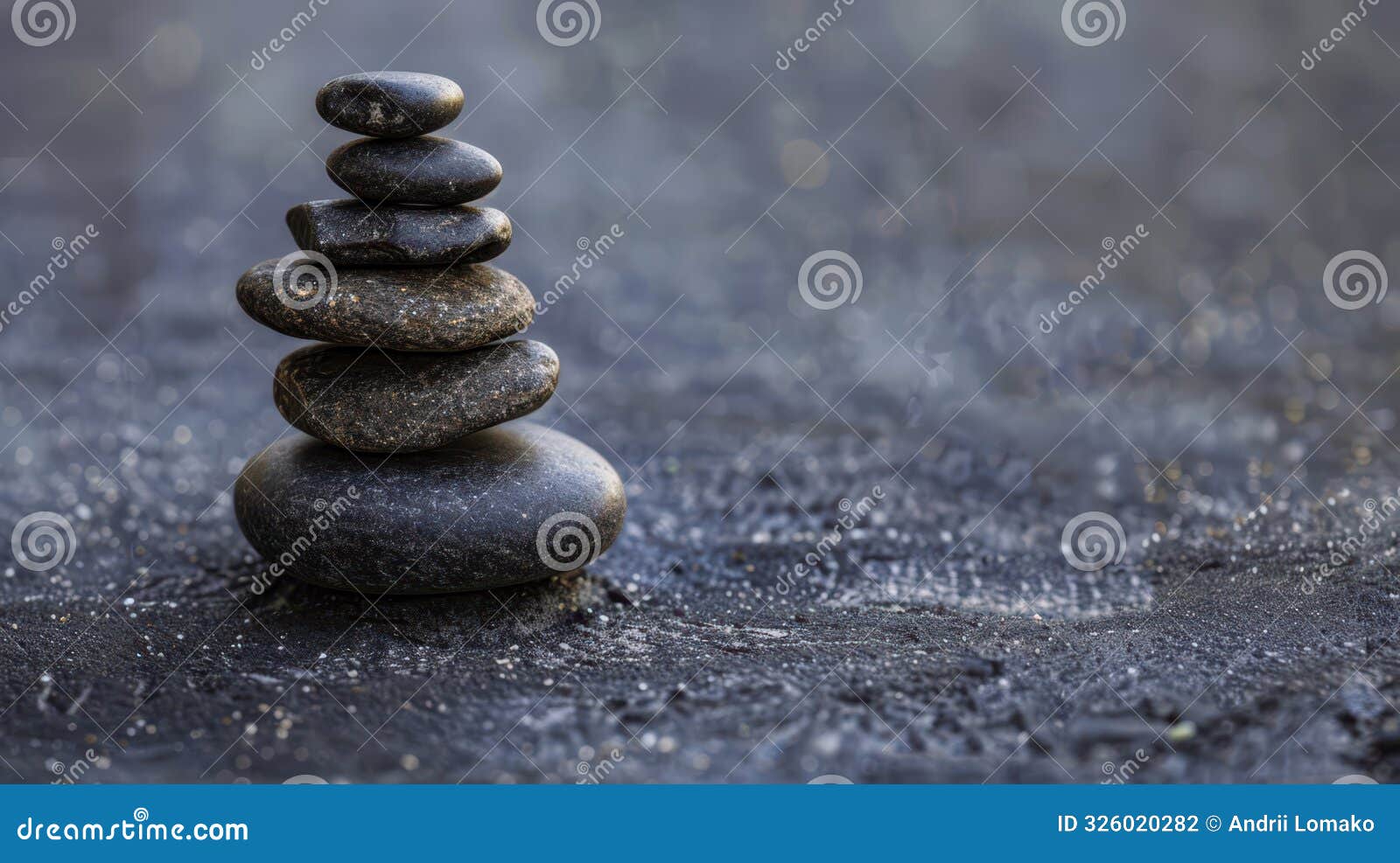 Stack of Smooth Gray Stones Balanced on a Rough Surface Stock Photo ...