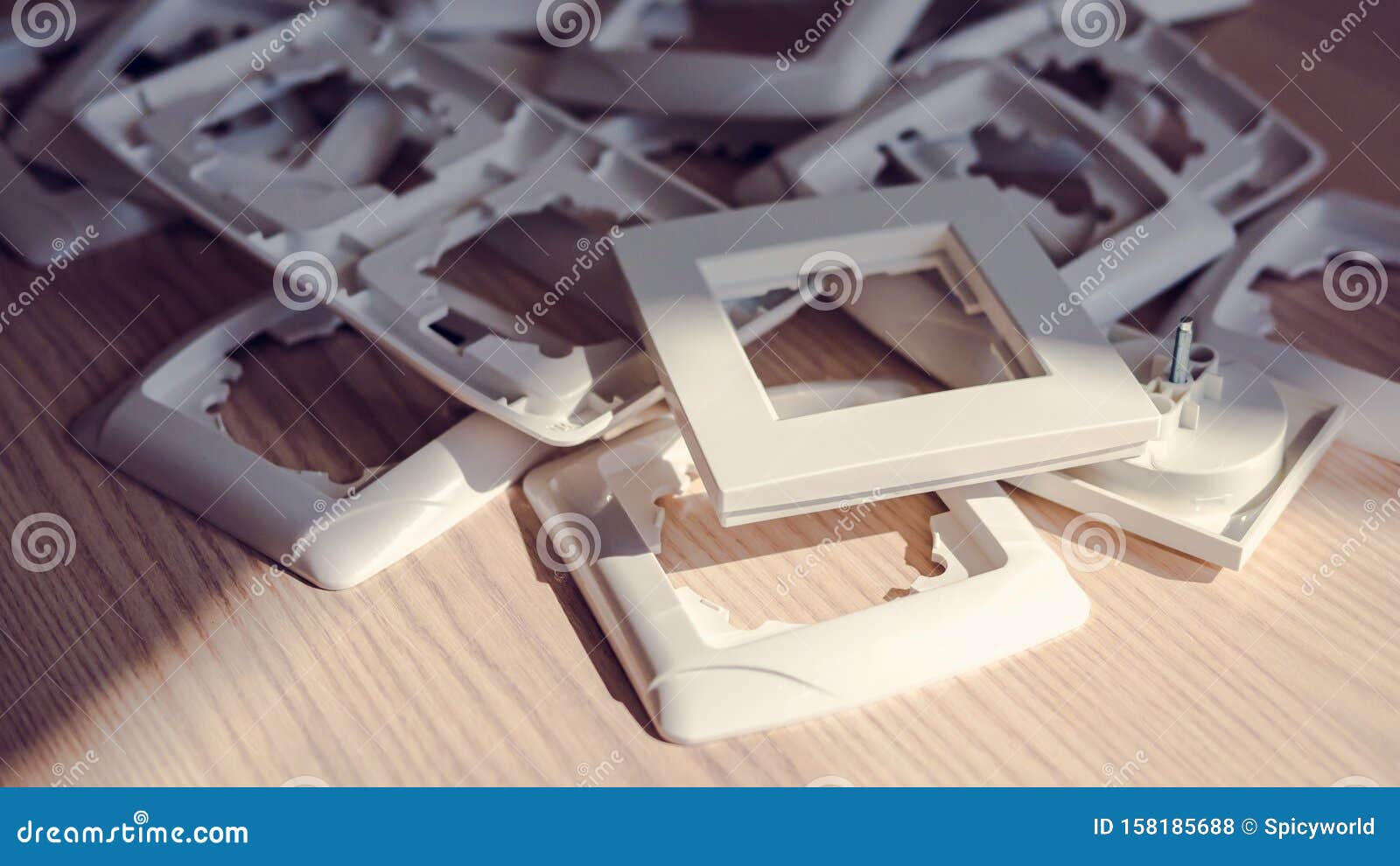 The Stack of Socket Frames on the Light Wooden Table Stock Photo ...