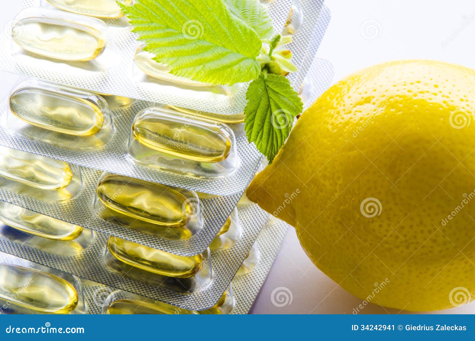 Stack of Soft Capsules and Lemon Stock Image - Image of branch, leaf ...