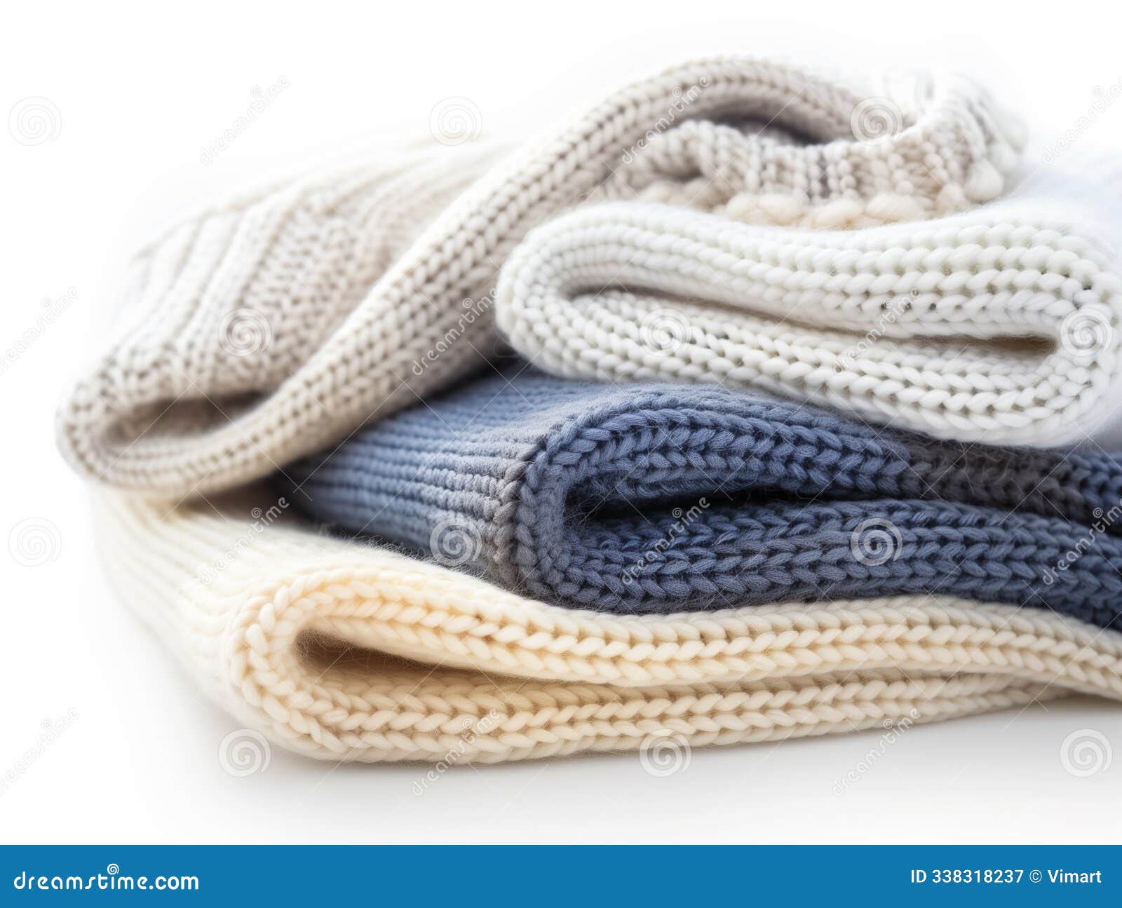 A Stack of Soft, Knitted Sweaters in a Neutral Color Palette. the Image ...
