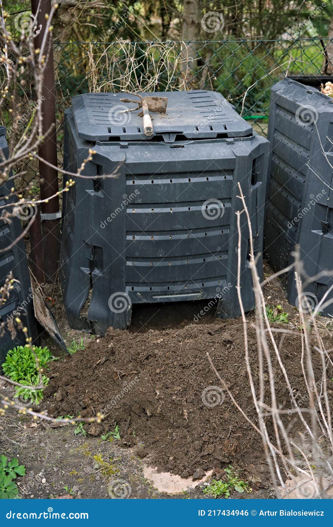A Stack of Soil in Front of the Composter Stock Photo - Image of ...