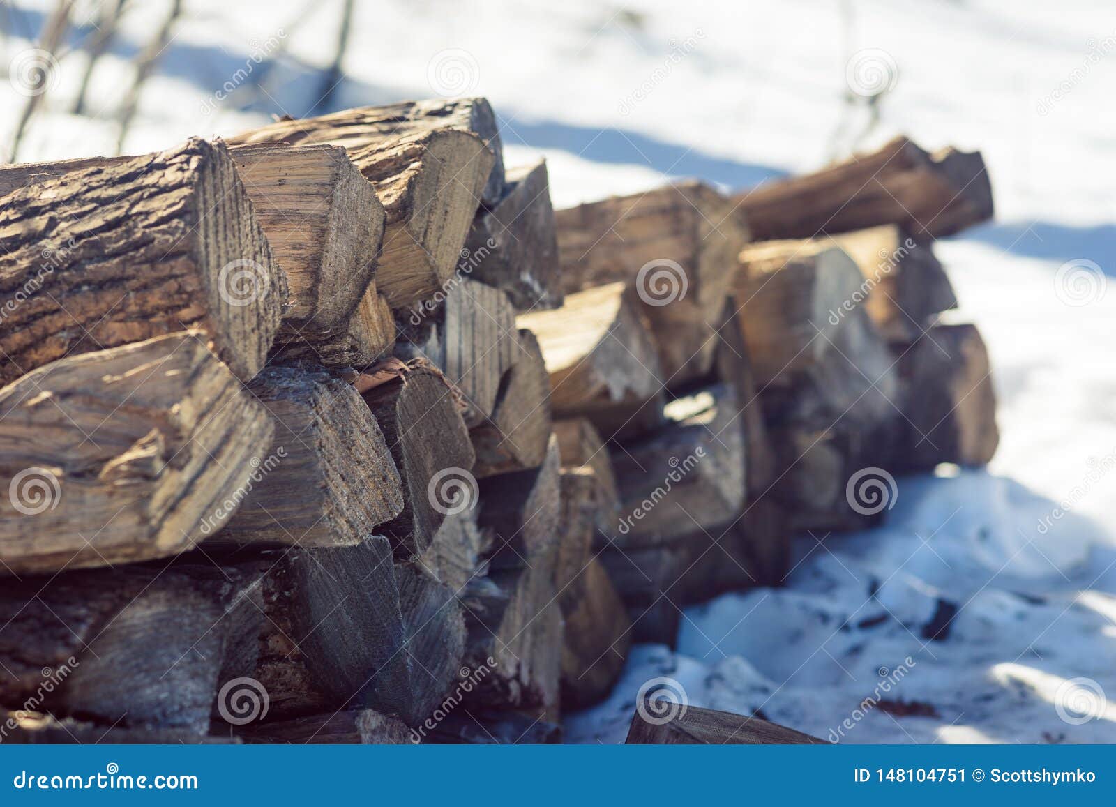 A Stack of Split Firewood on Snow Covered Ground Stock Image - Image of ...