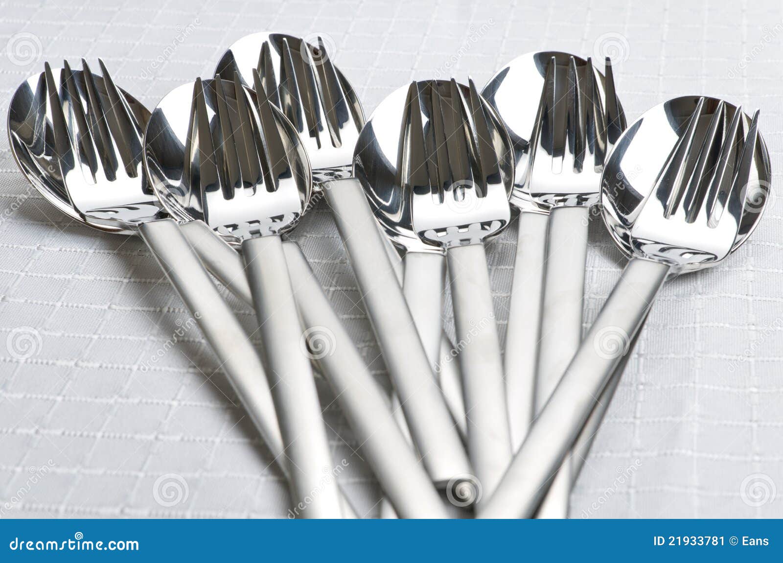 Stack of spoons and forks stock image. Image of tablecloth - 21933781