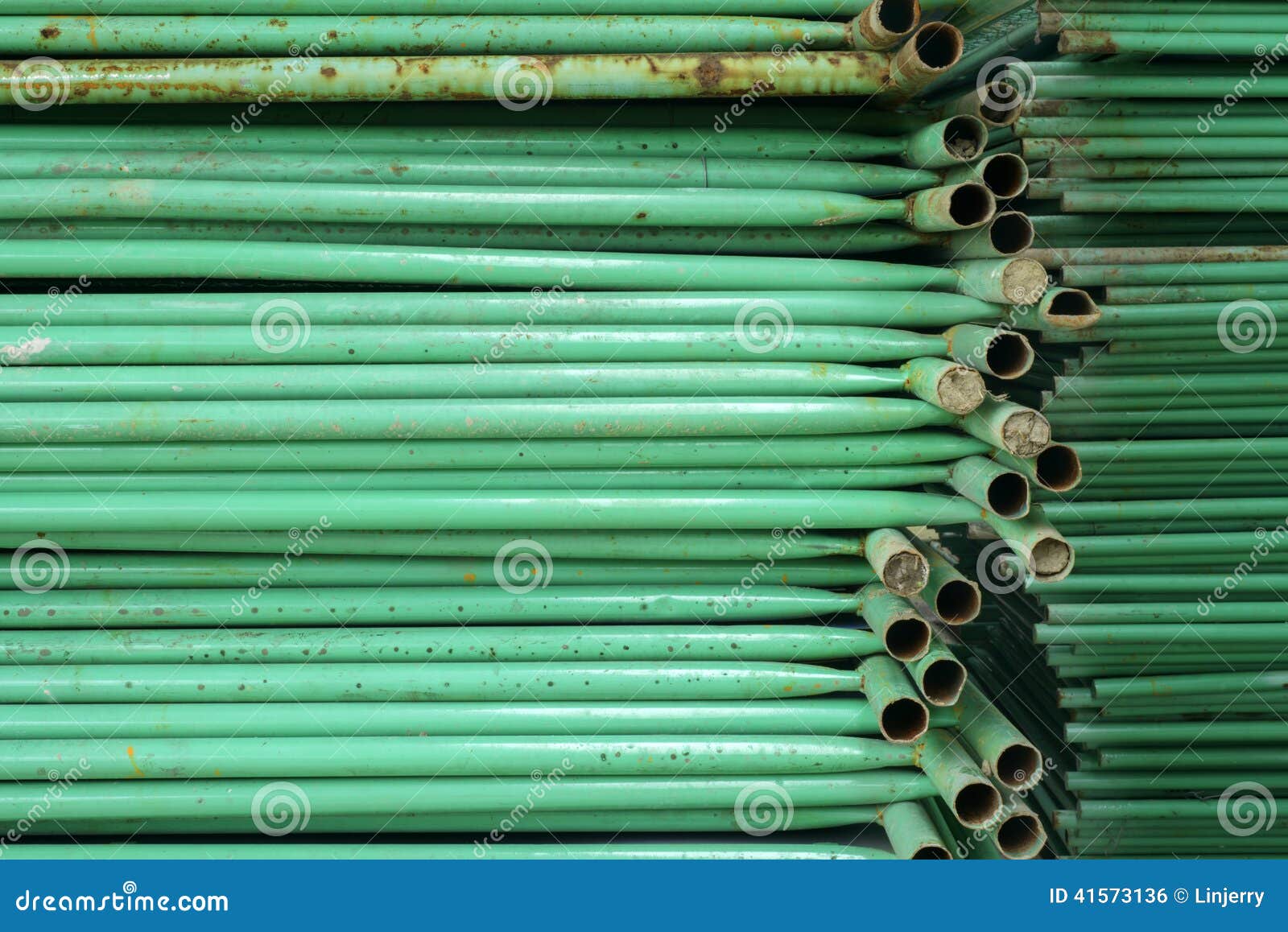 Stack of steel pipes stock photo. Image of industrial - 41573136