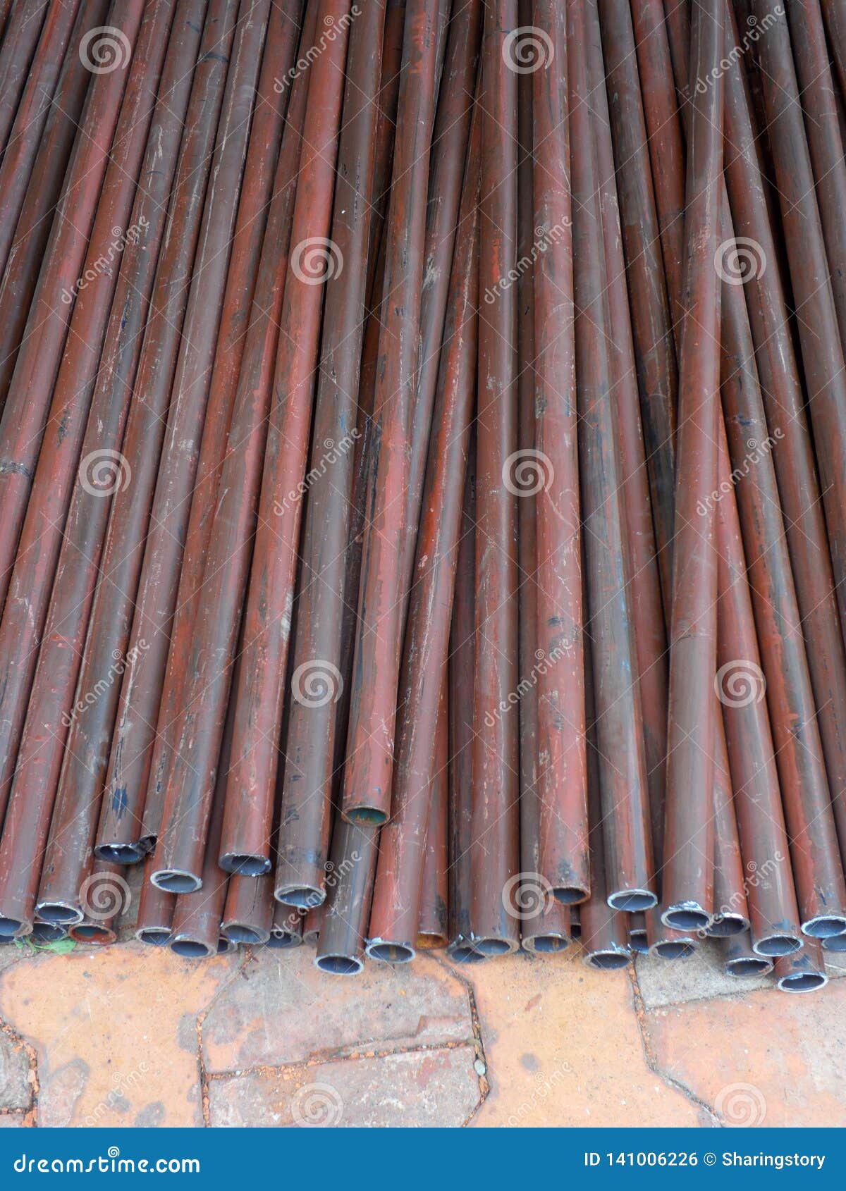Stack of steel pipes stock photo. Image of iron, storage - 141006226