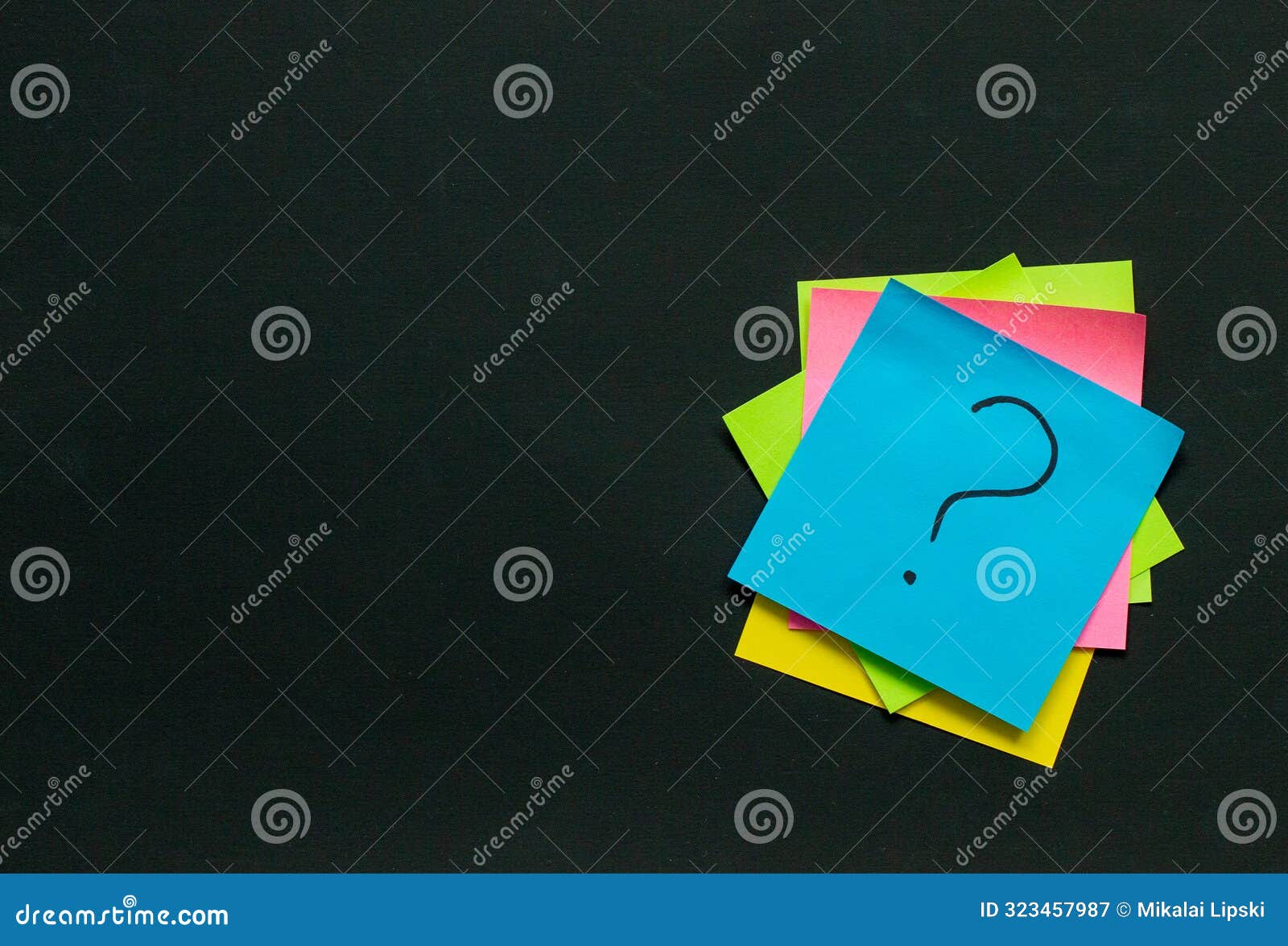 Stack of Stickers with Questions on a Black Board, Questions and Idea ...
