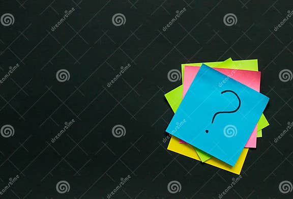 Stack of Stickers with Questions on a Black Board, Questions and Idea ...