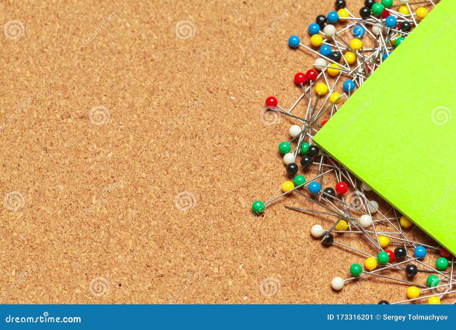 Stack of Sticky Notes Surrounded with a Bunch of Colorful Push Pins ...