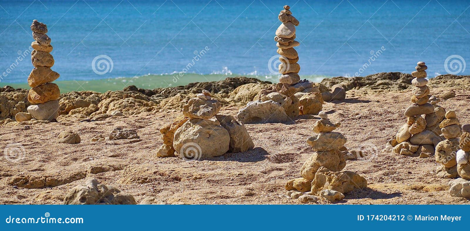 Stacks of Stones in Front of Blue Ocean Stock Photo - Image of cairn ...