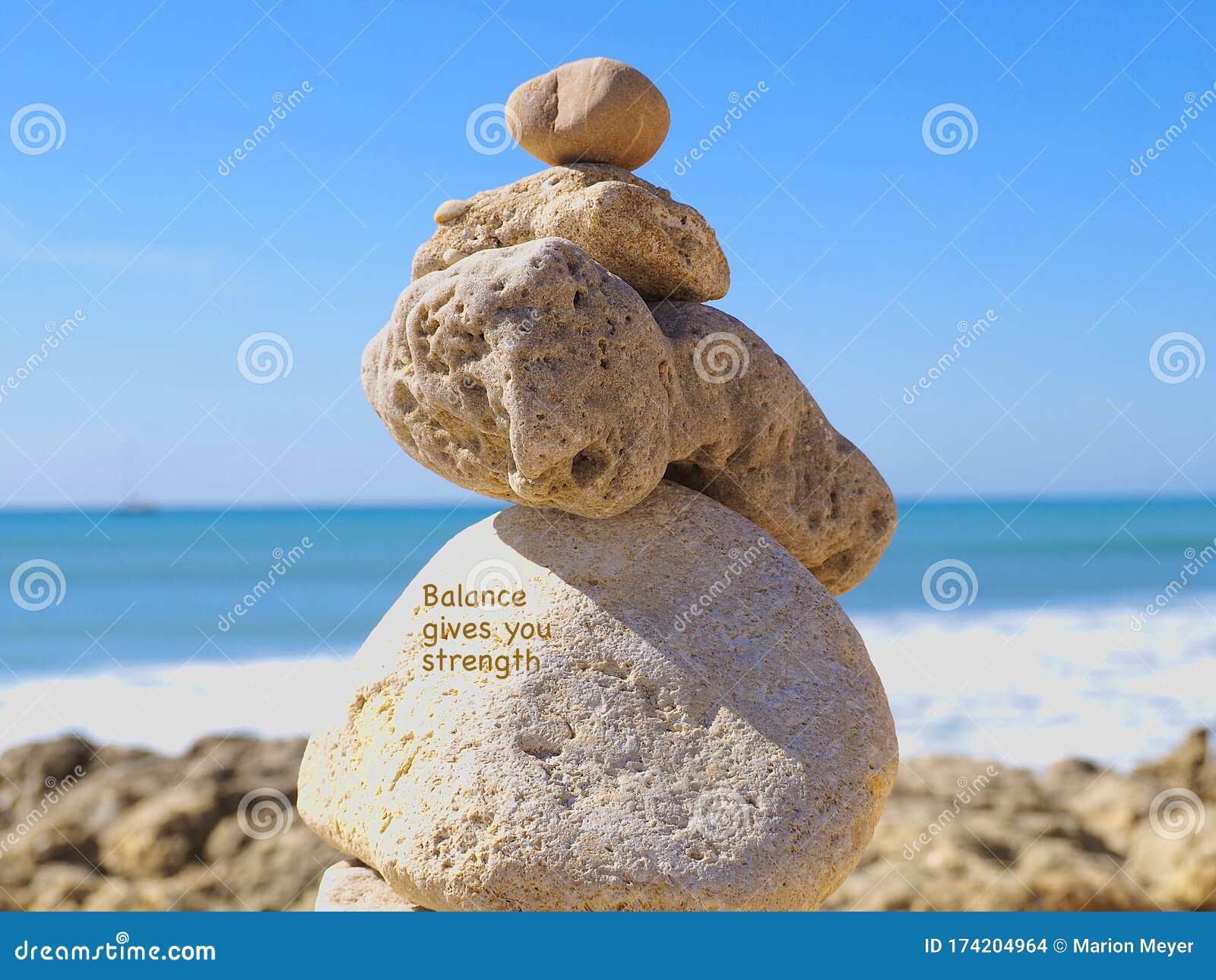 Stacks of Stones in Front of Blue Ocean Stock Photo - Image of ...