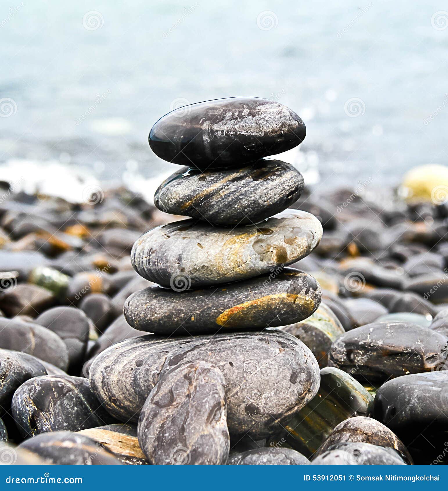 Stack of stones on beach stock image. Image of lastone - 53912051