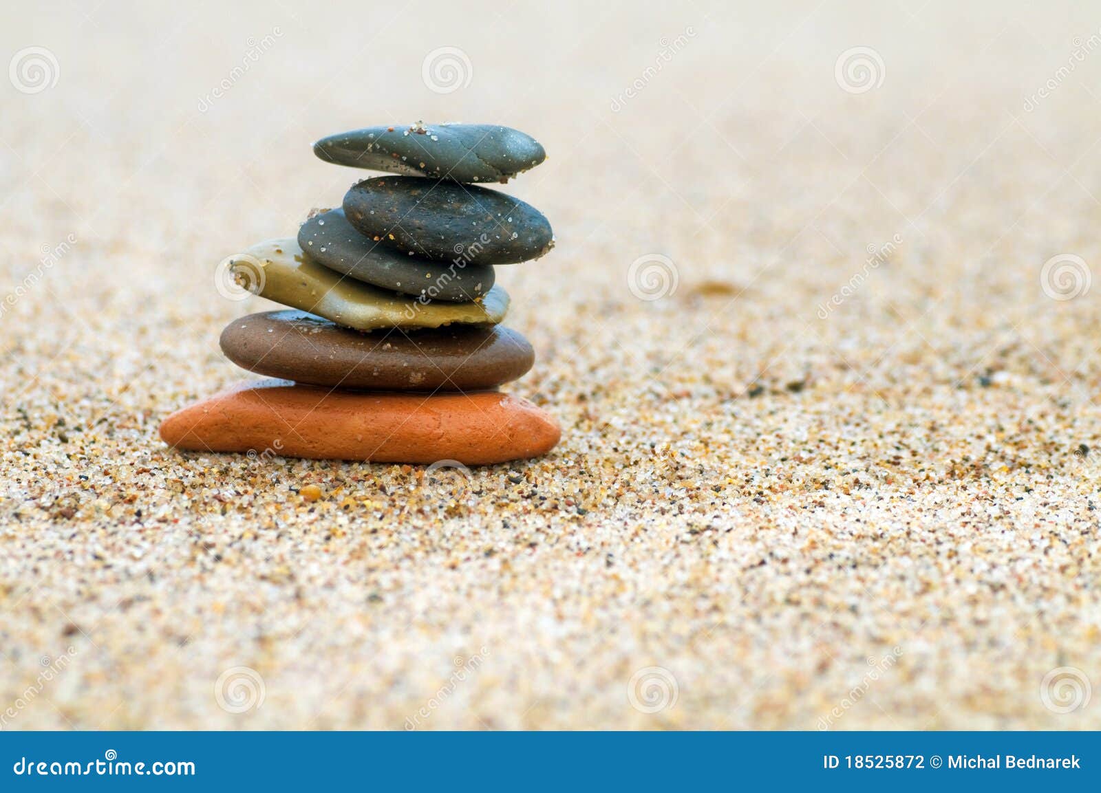 Stack of stones on sand stock photo. Image of stone, building - 18525872