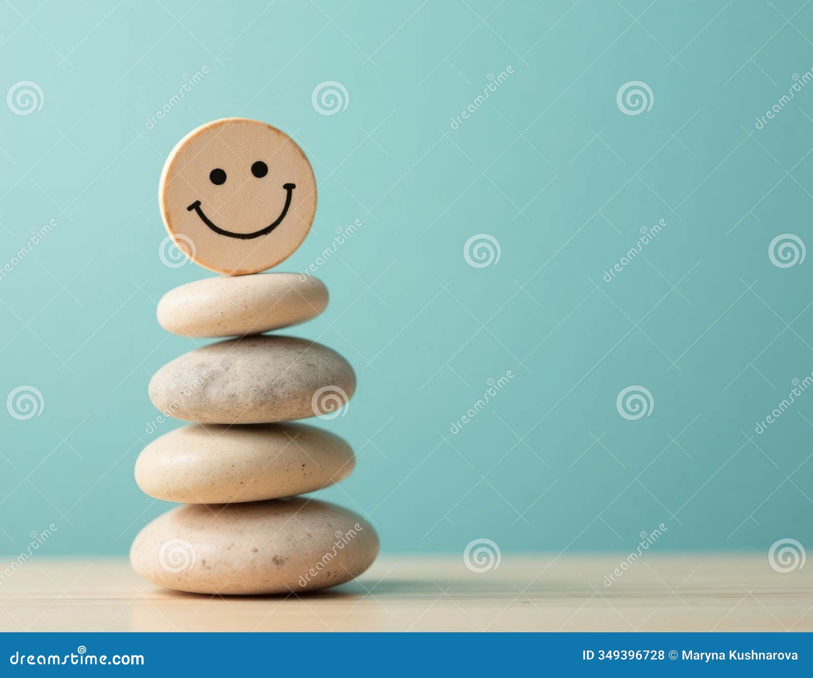 Stack of Stones with a Smiley Face. Represents Employee Satisfaction ...
