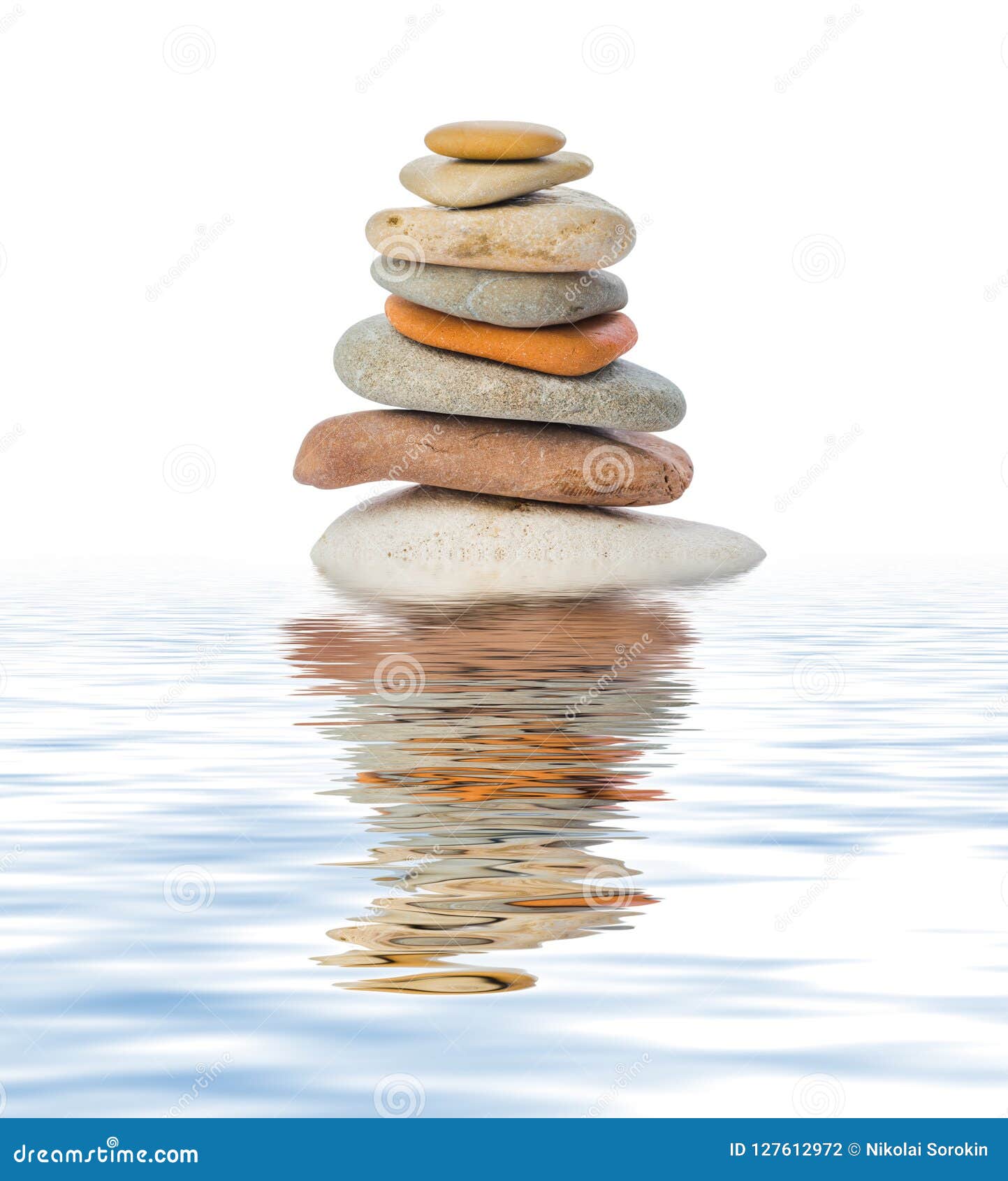 Stack of stones in water stock photo. Image of beach - 127612972