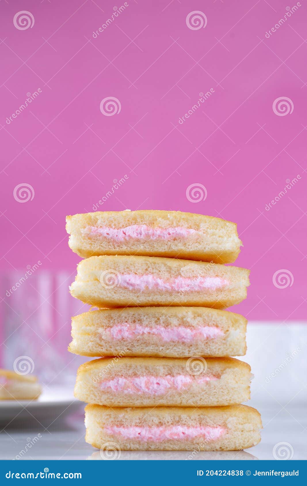 A Stack of Strawberry Mini Cakes Stock Photo - Image of light, frosting ...
