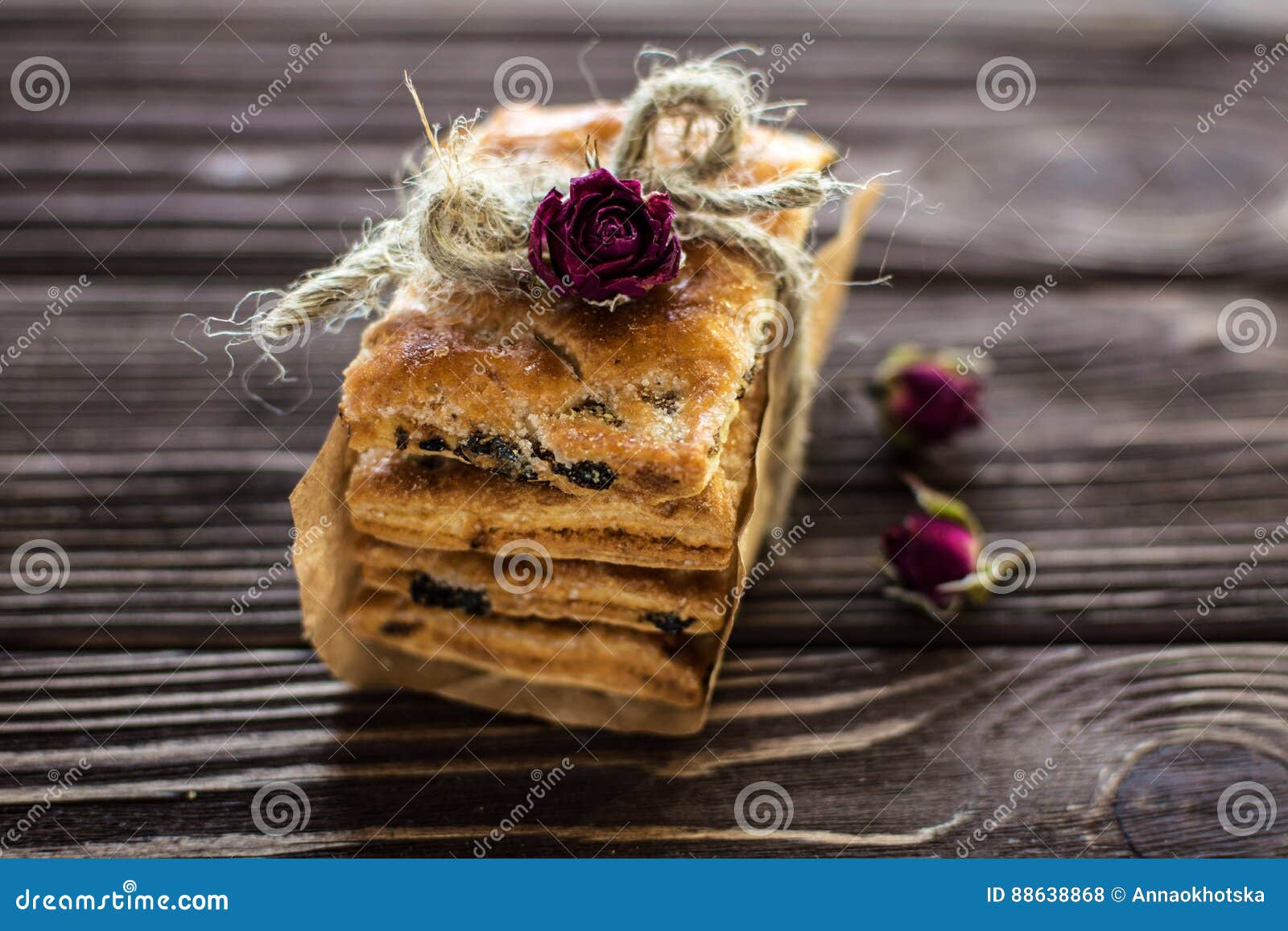 Stack of Sweet Crackers Decorated with Roses on Rustic Background Stock ...