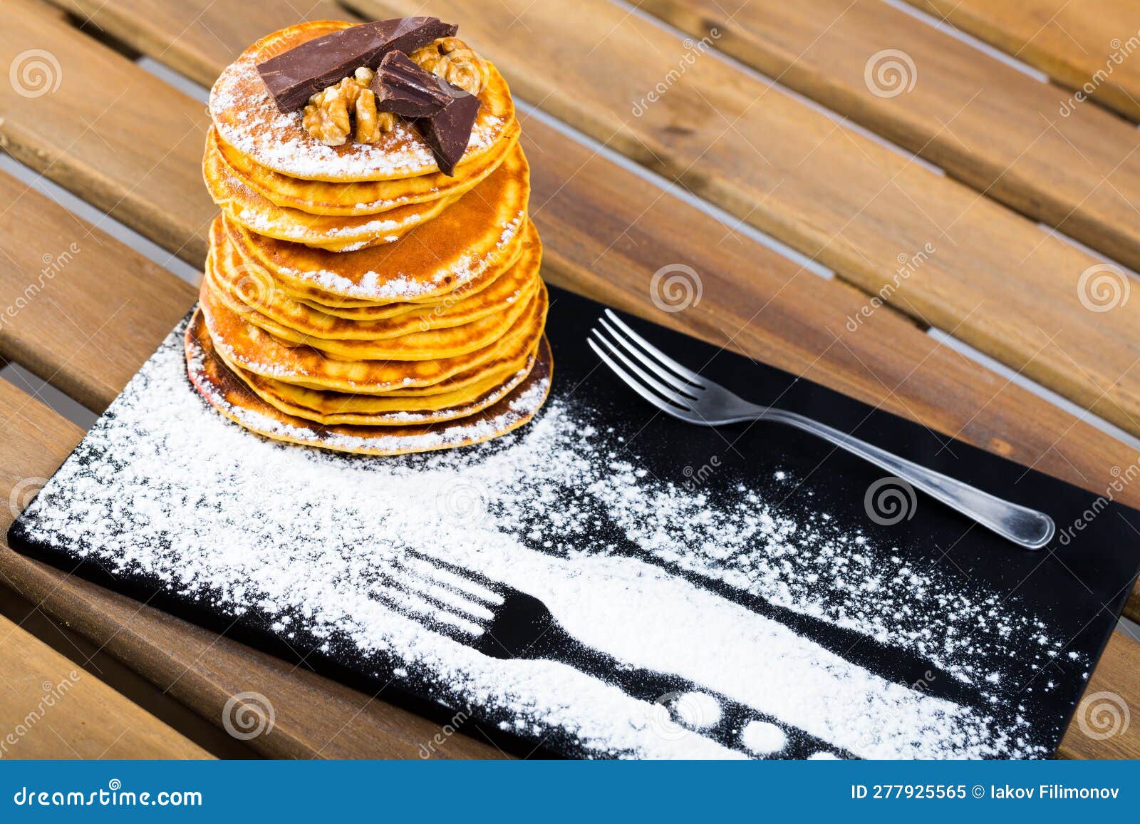 Stack of Sweet Pancakes with Chocolate, Walnut and Powdered Sugar Stock ...