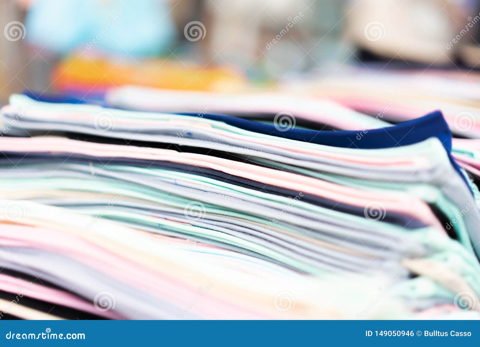 Stack T-shirts on Shelf in a Shop Stock Photo - Image of shelves, clean ...