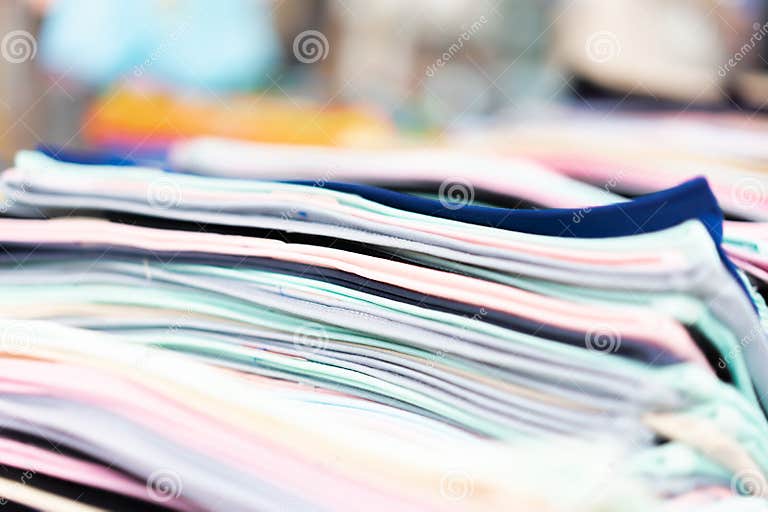 Stack T-shirts on Shelf in a Shop Stock Photo - Image of shelves, clean ...