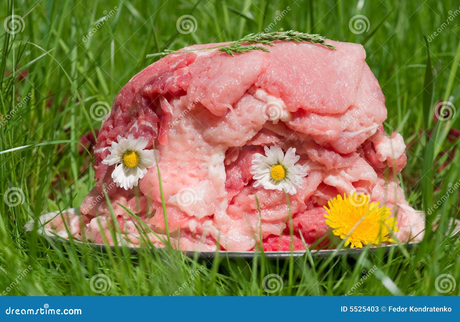 Stack Of Tender Beef Steaks With Flowers And Herbs Picture. Image: 5525403