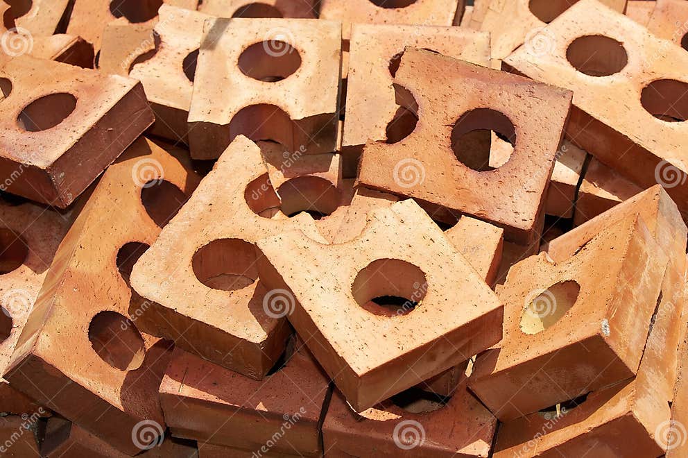 Stack of Terracotta Bricks in the Sun Stock Photo - Image of perfect ...