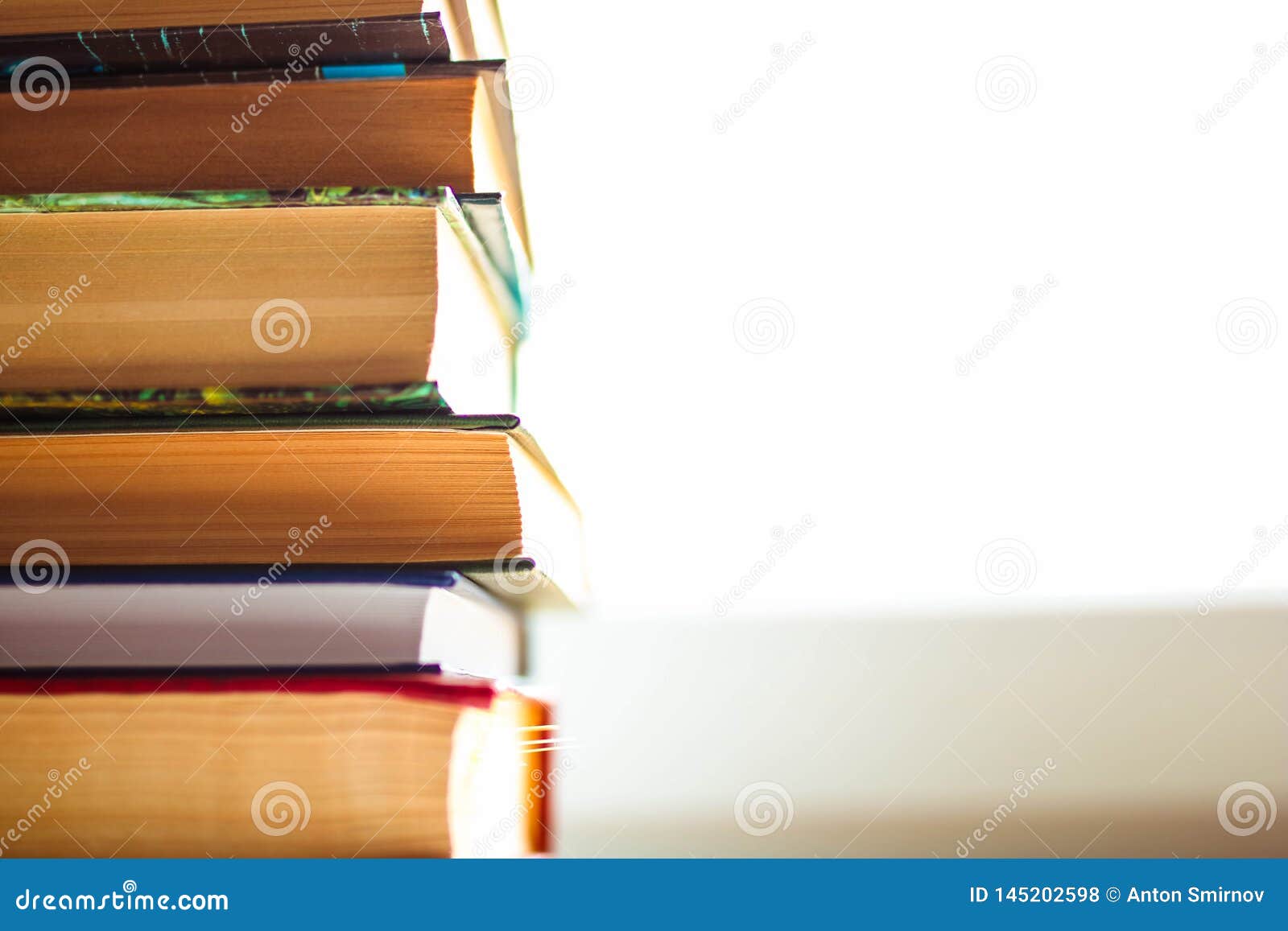 Books Stack on White Background. Blurred Book Concept. Educational ...