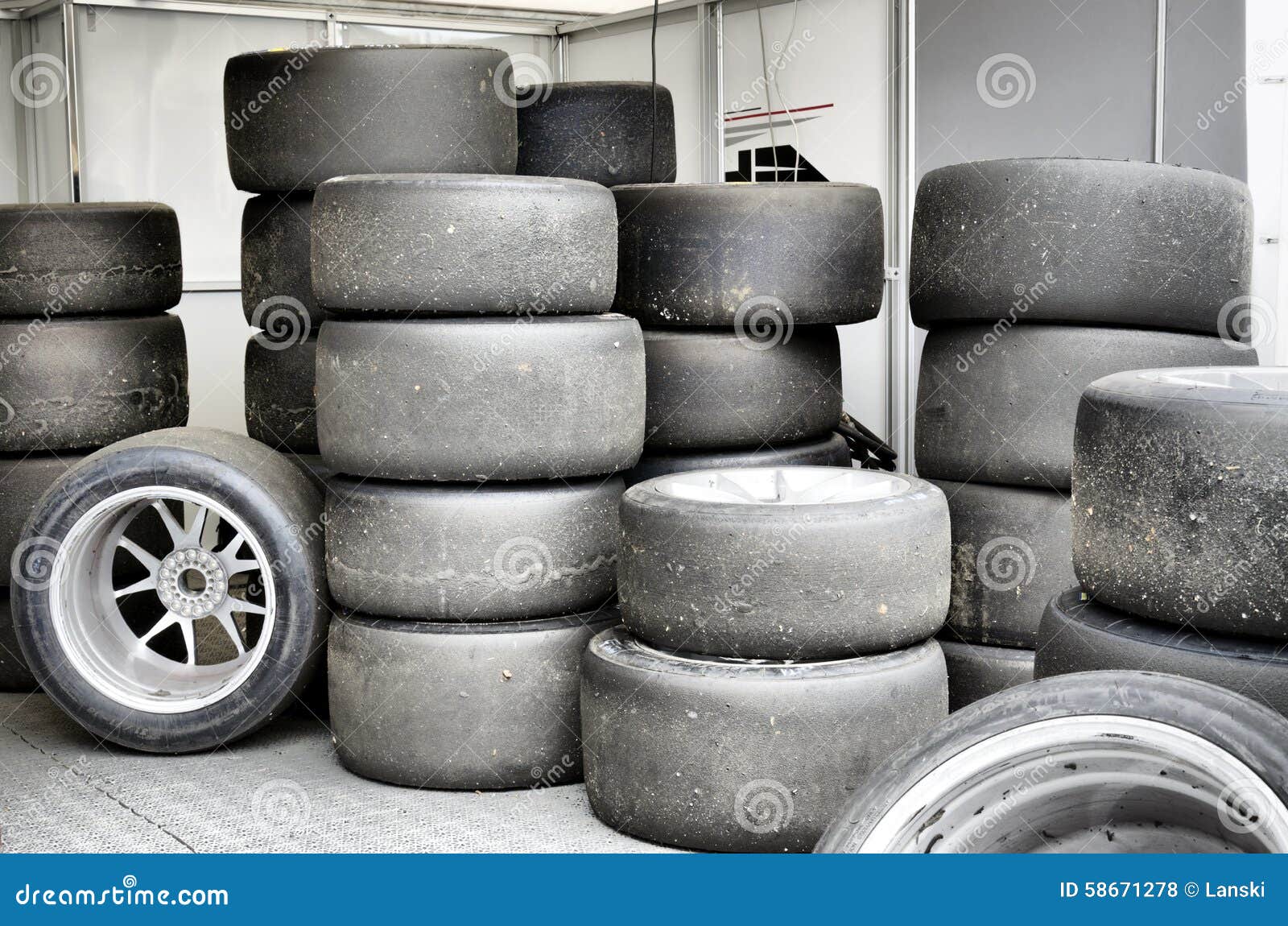 Stack of threadbare wheels stock photo. Image of pitstop - 58671278