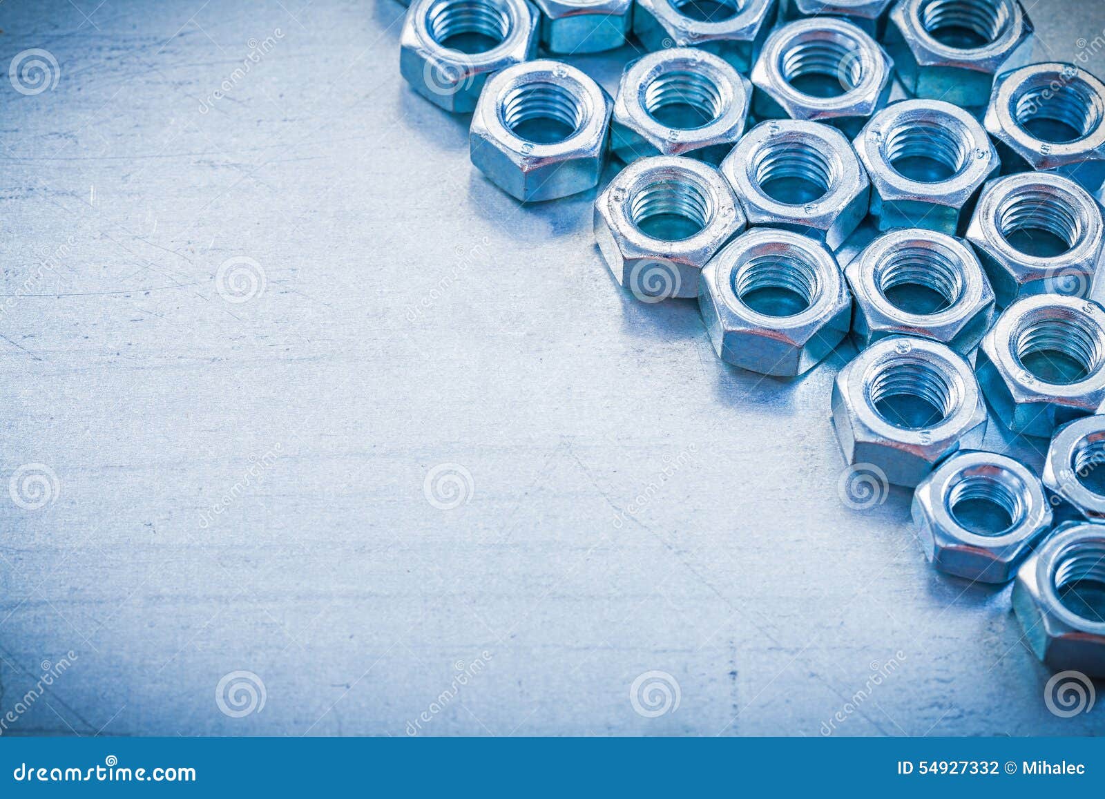 Stack of Threaded Nuts on Metallic Stock Photo - Image of tapped ...