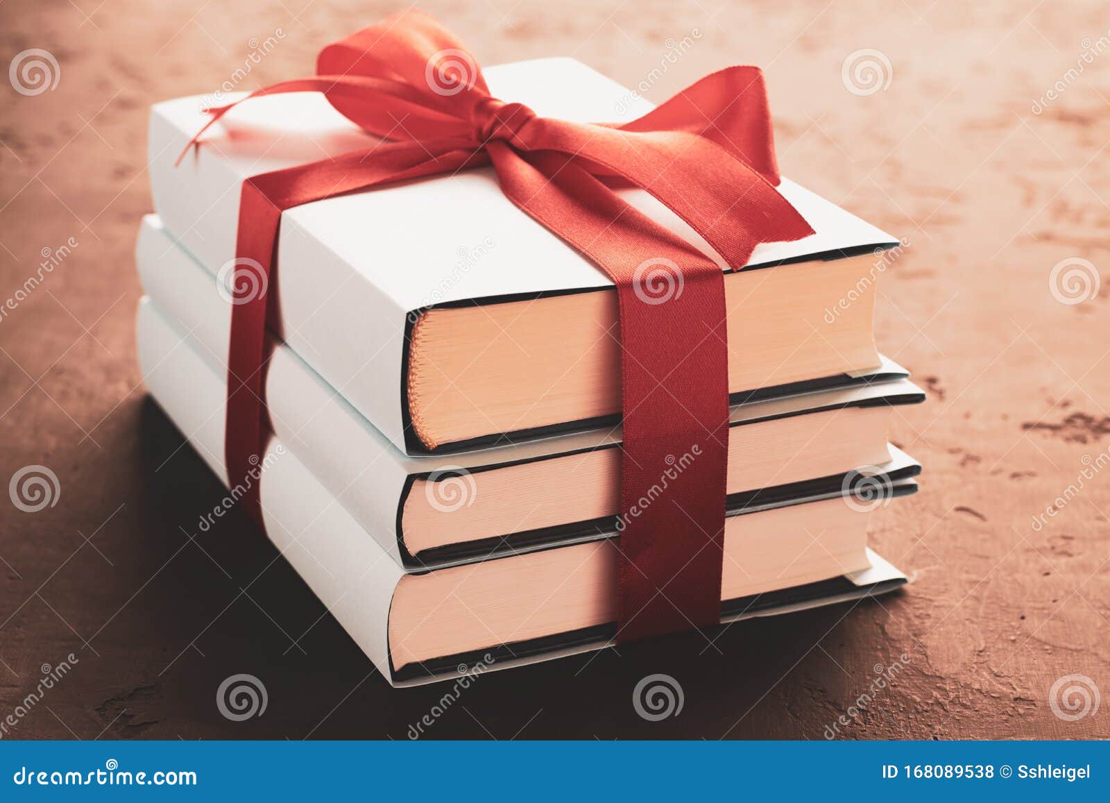 A Stack of Three Books Tied with a Ribbon: the Concept of a Good Book ...