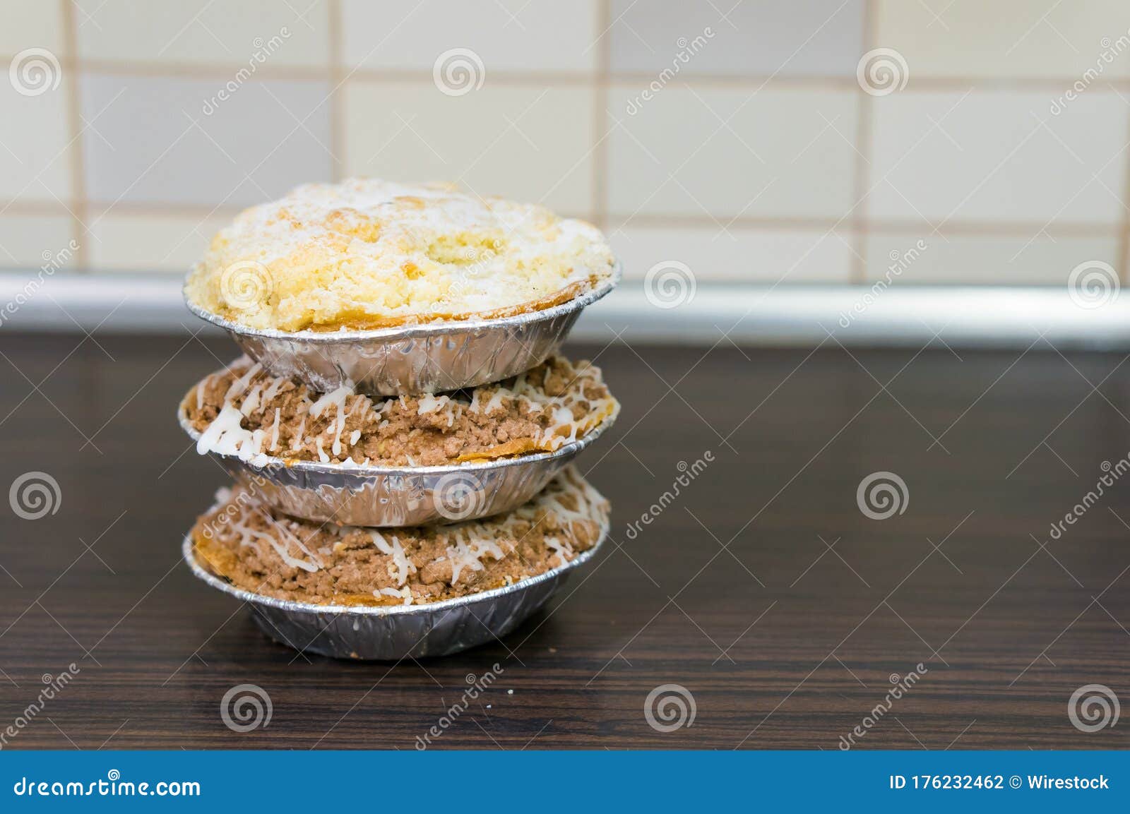 Stack of Three Different Pies on a Wooden Surface Stock Photo - Image ...