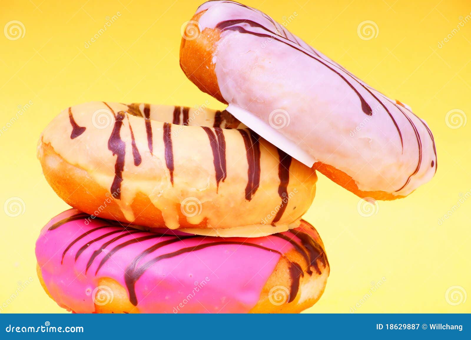 Stack of three donuts stock image. Image of dessert, snack - 18629887