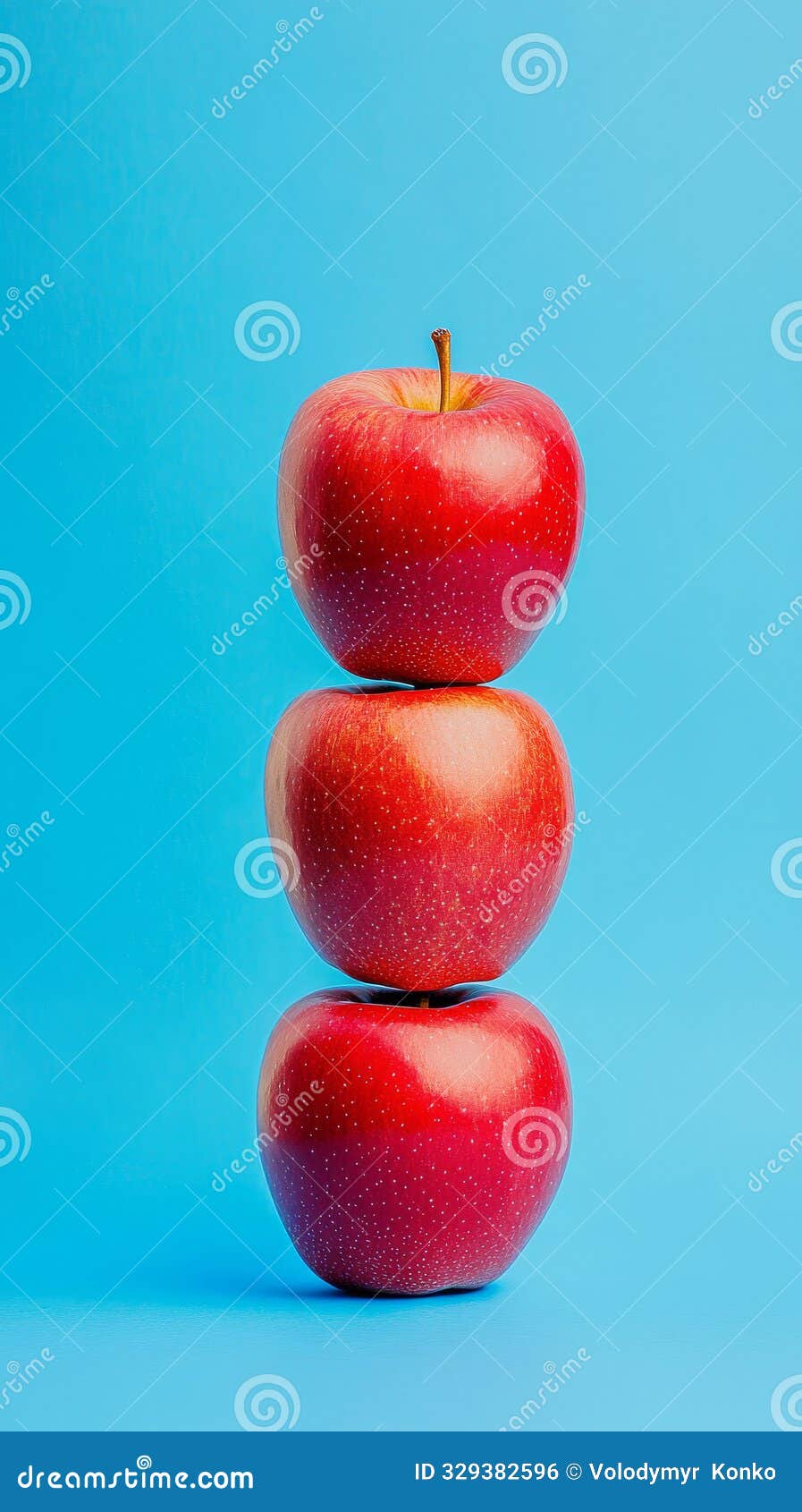 Stack of Three Red Apples on Blue Background, Colorful and Playful Food ...