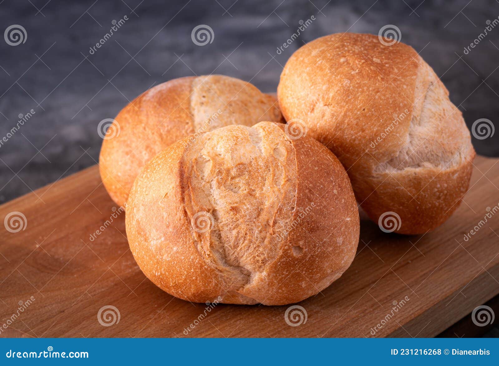 Stack of Three Small Loaves of Sourdough Bread Stock Photo - Image of ...