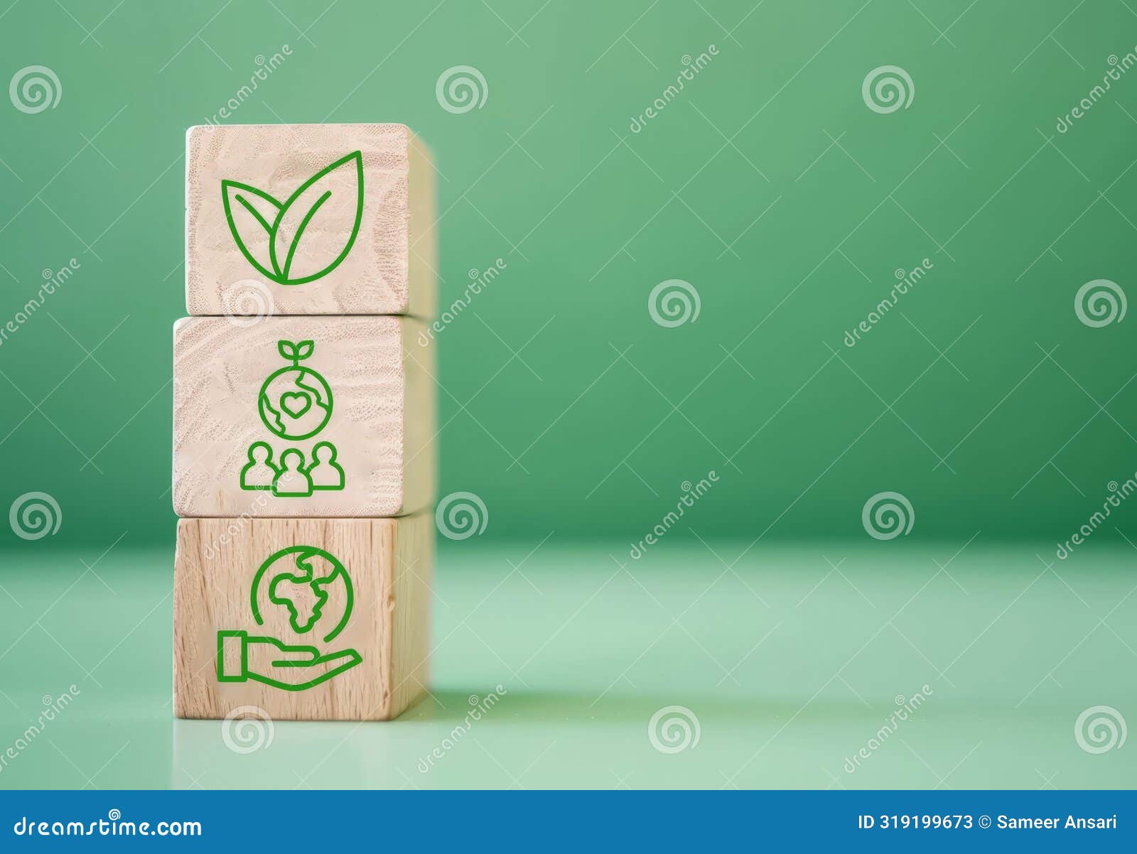 A Stack of Three Wooden Blocks with Environment Icons on Green ...
