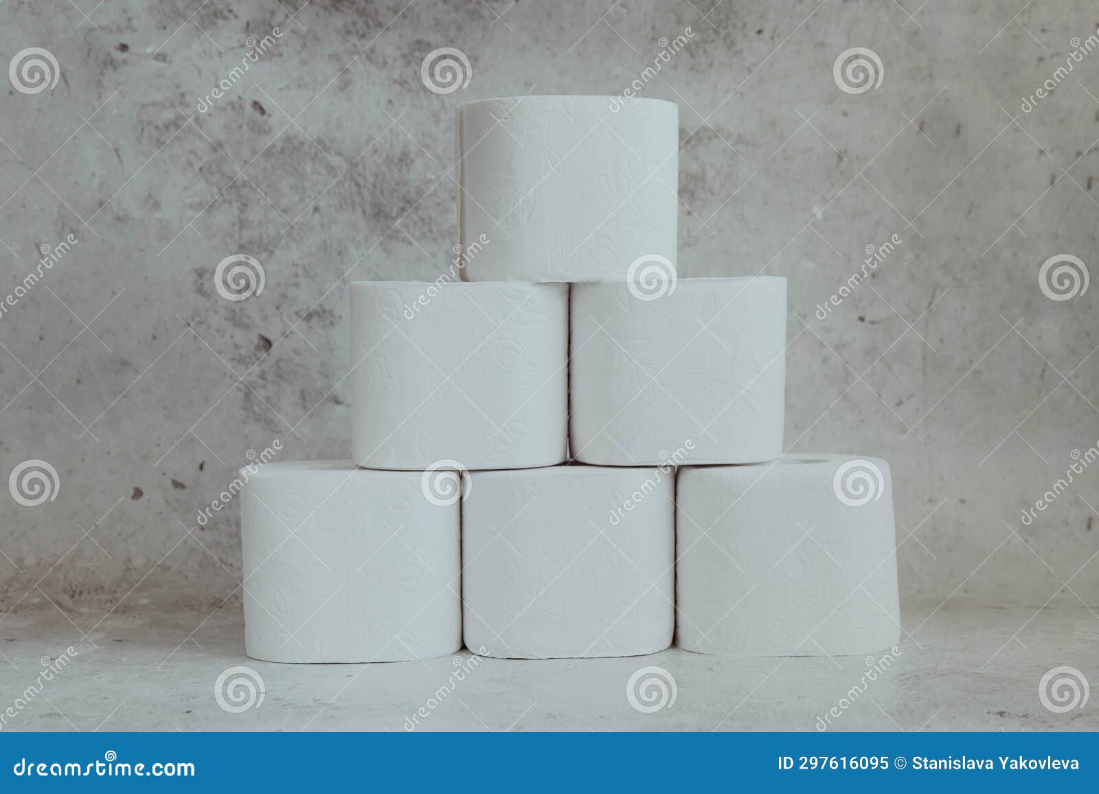 Stack of Toilet Paper Rolls on a Gray Light Background Stock Image ...