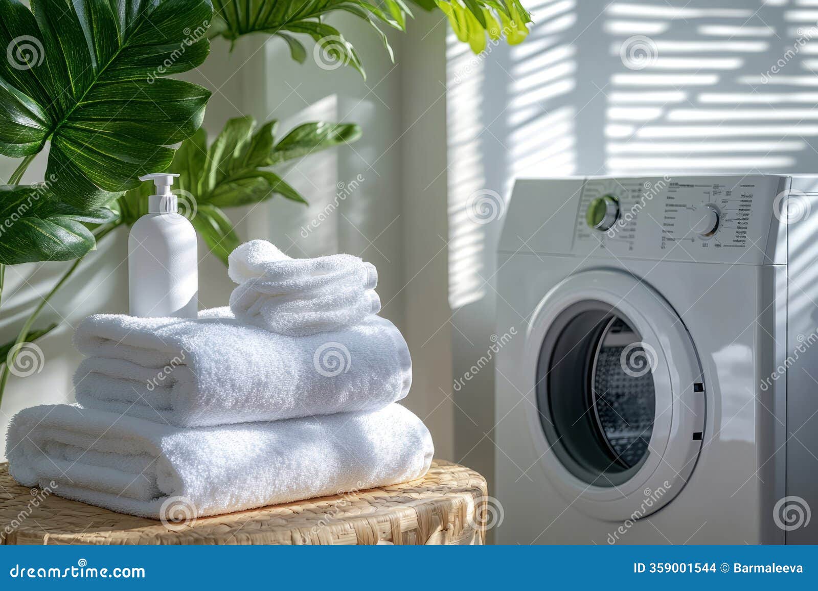 Stack Towels with a Soap Dispenser beside a Washing Machine in Laundry ...
