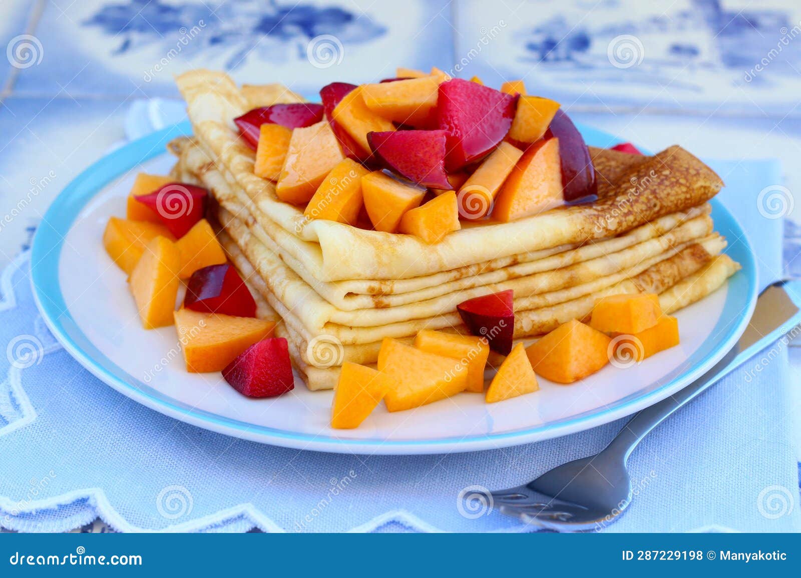 Stack of Triangle Crepes with Fruits Stock Photo - Image of pancakes ...