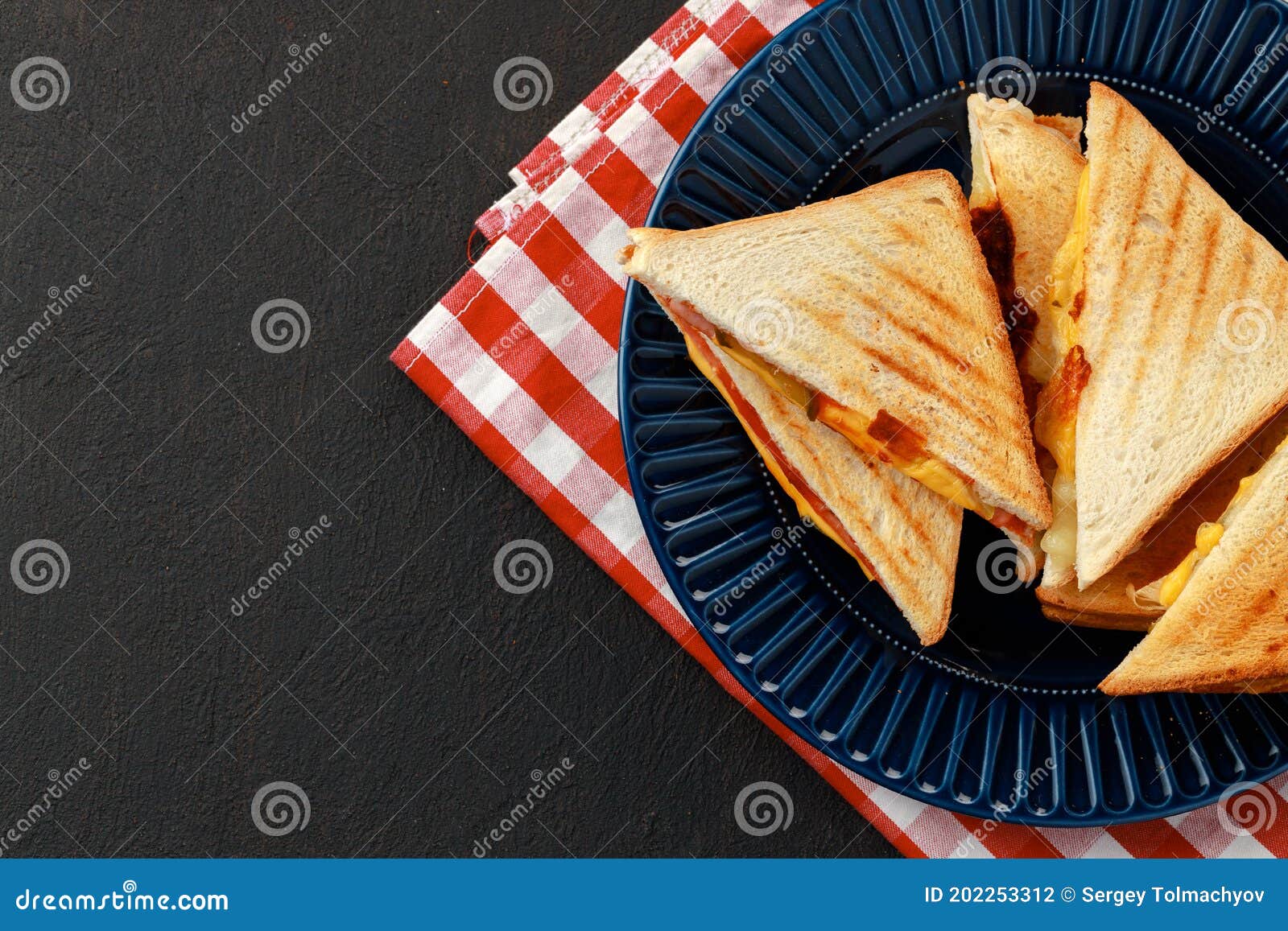 Stack of Triangle Sandwiches in Plate Close Up Stock Photo - Image of ...