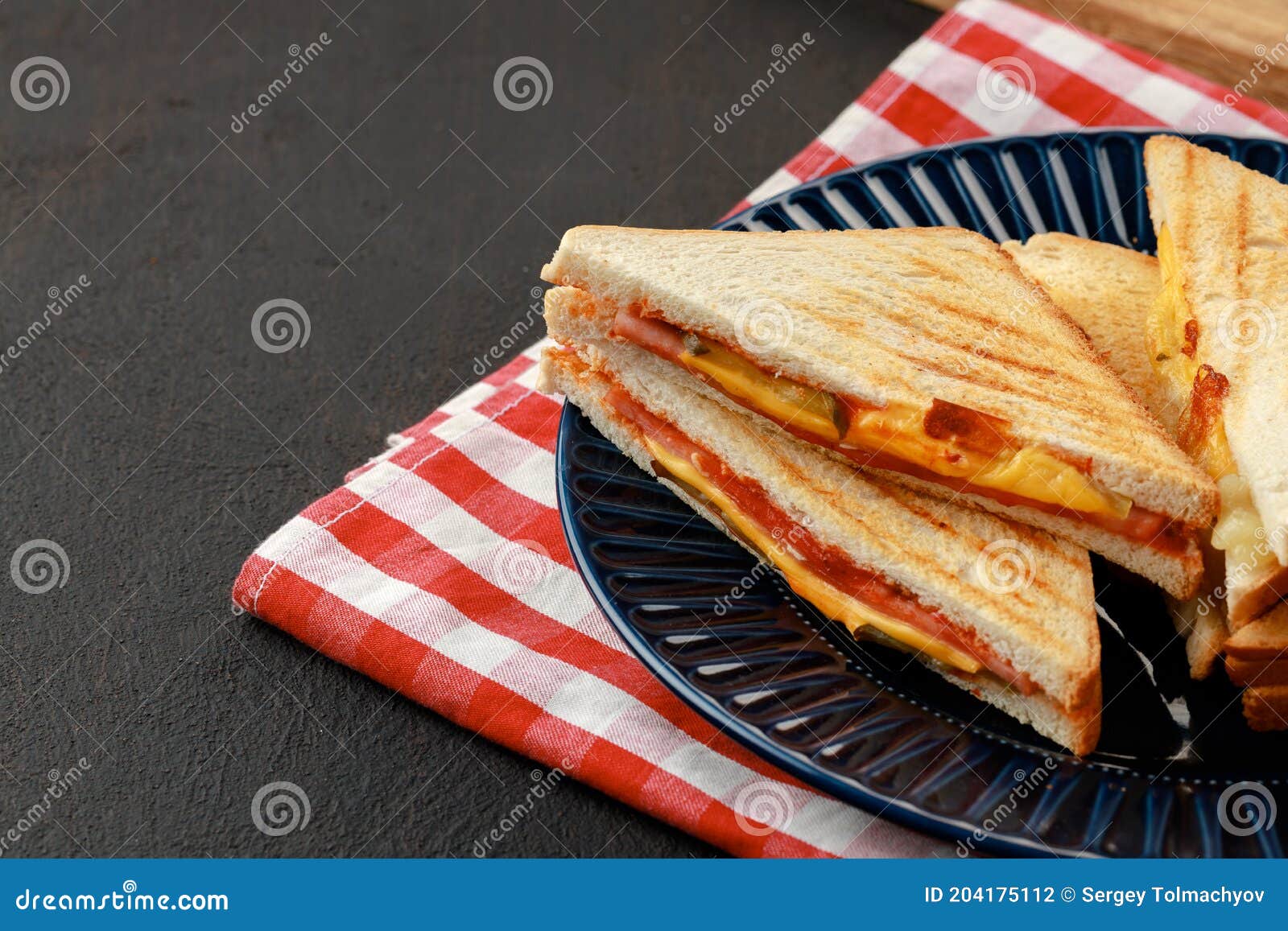 Stack of Triangle Sandwiches in Plate Close Up Stock Photo - Image of ...