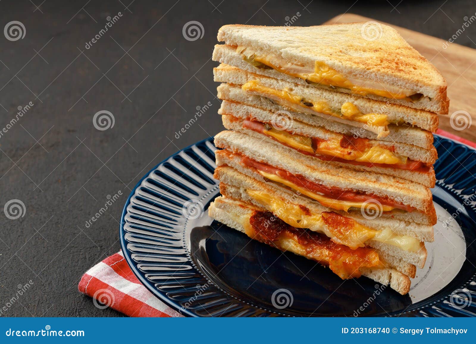 Stack of Triangle Sandwiches in Plate Close Up Stock Photo - Image of ...